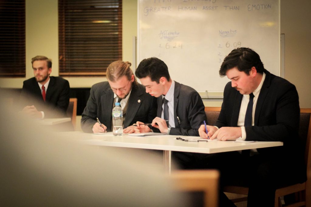 Team Emotion Wins Debate on Intelligence